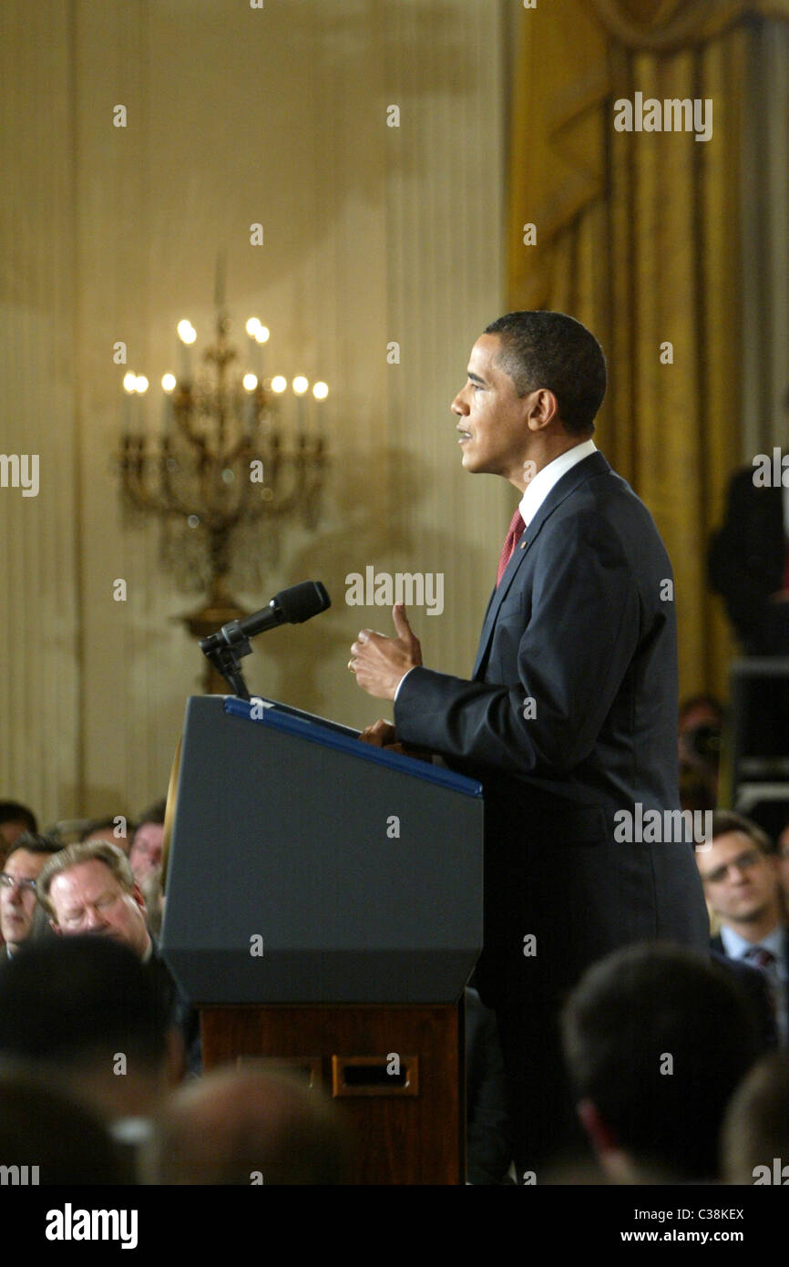 U.S. President Barack Obama answers questions in the East Room of the ...
