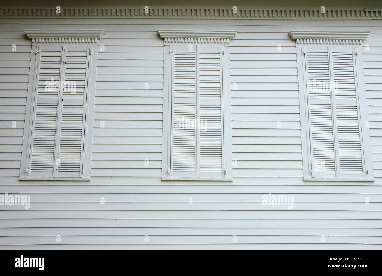 Abstract view of church windows with shutters closed Stock Photo - Alamy
