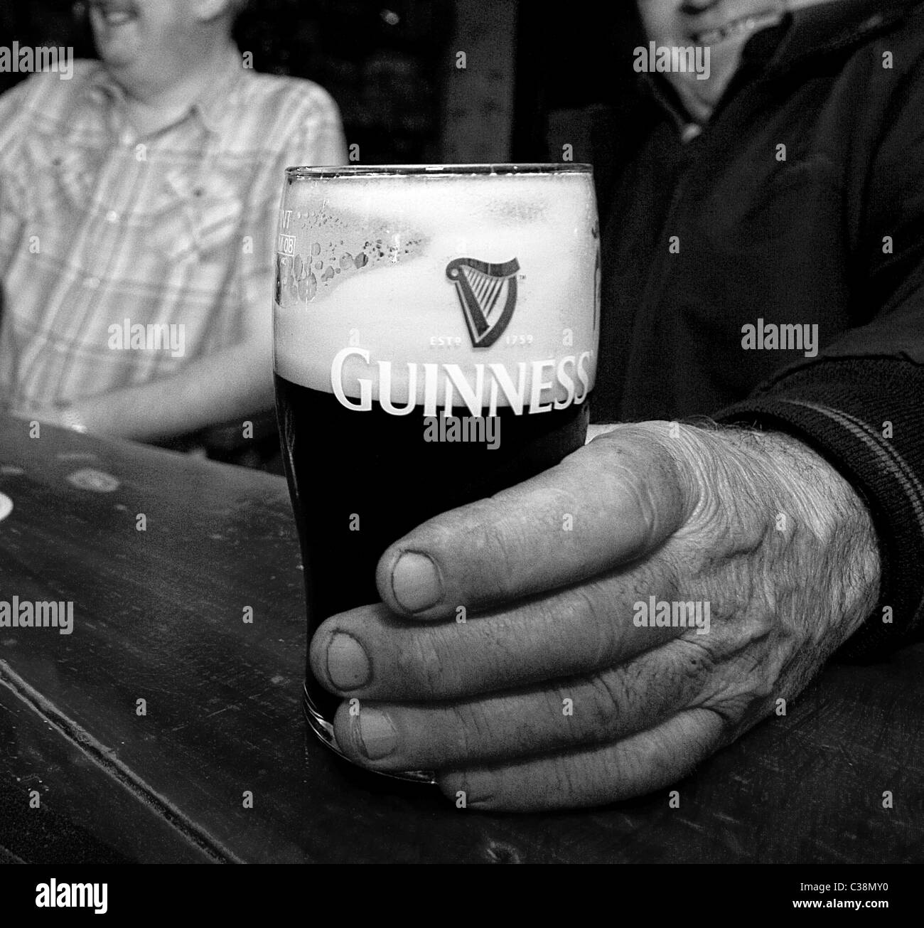 Man drinking guinness hi-res stock photography and images - Alamy