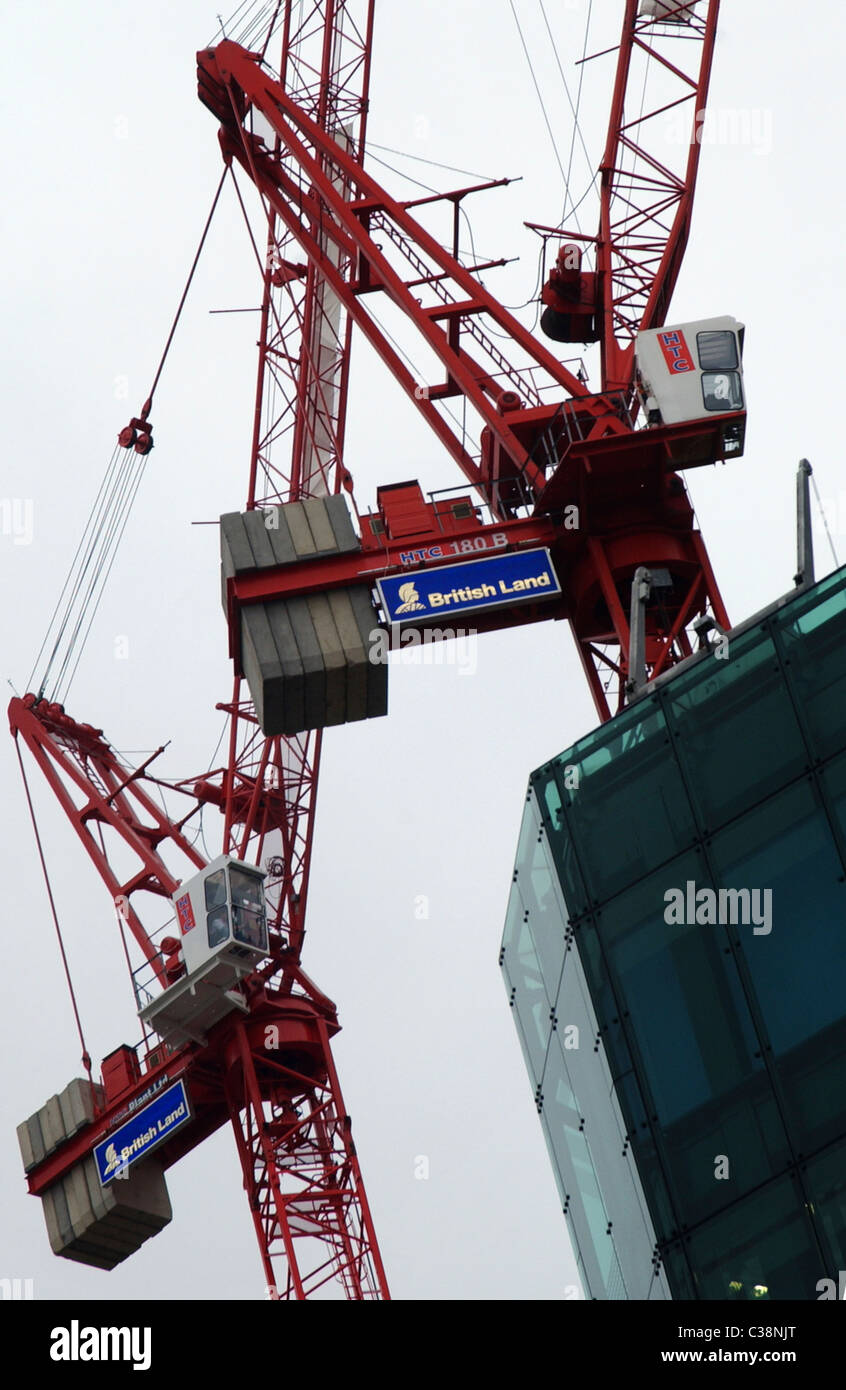 Two British Land Cranes on a Urban Construction Site in the City of ...