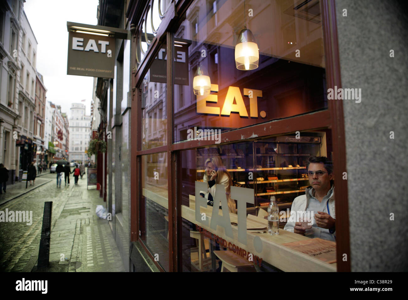 Pictured shows: EAT. customers eating the food inside a restaurant in ...