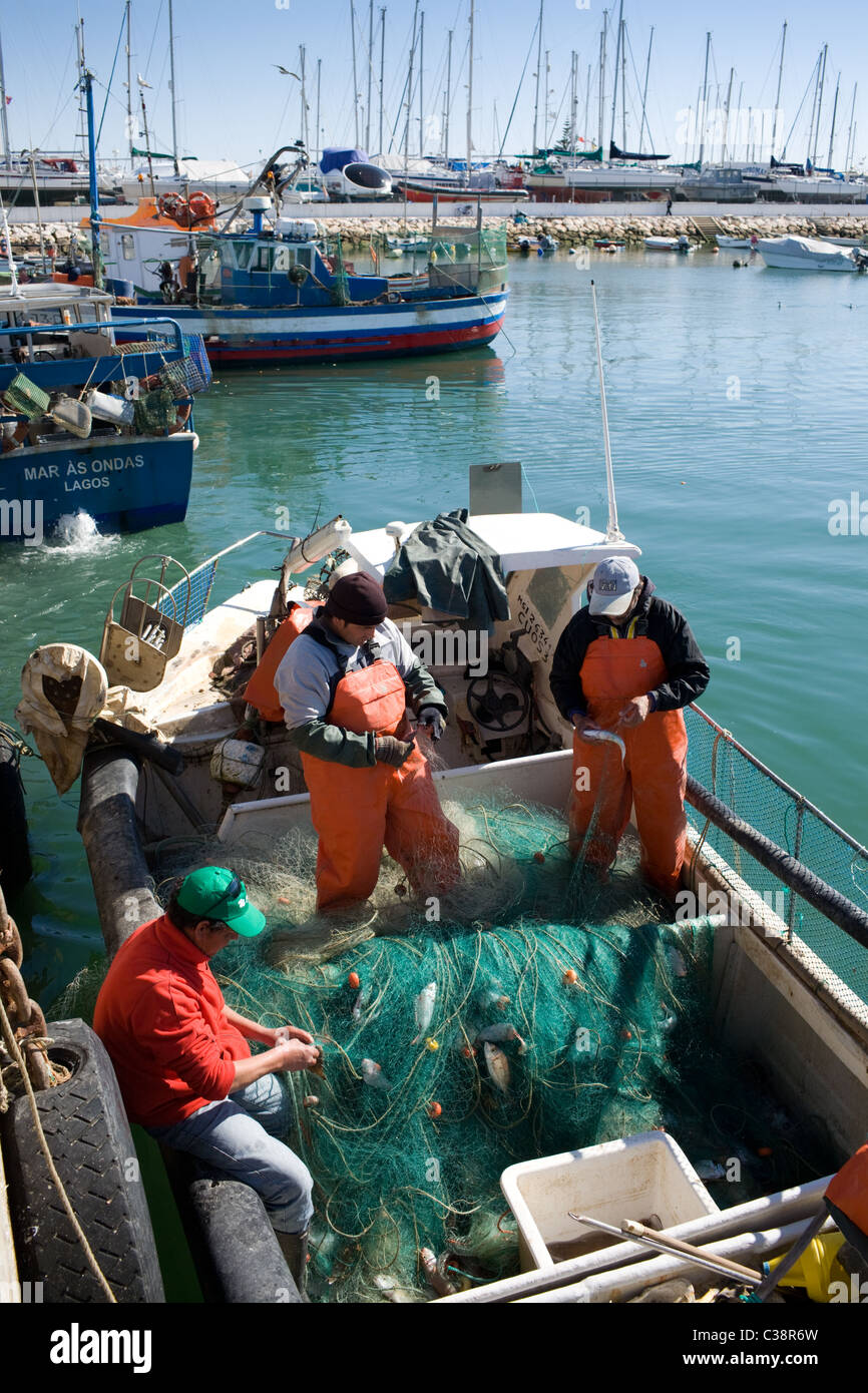 Fish from boat hi-res stock photography and images - Alamy