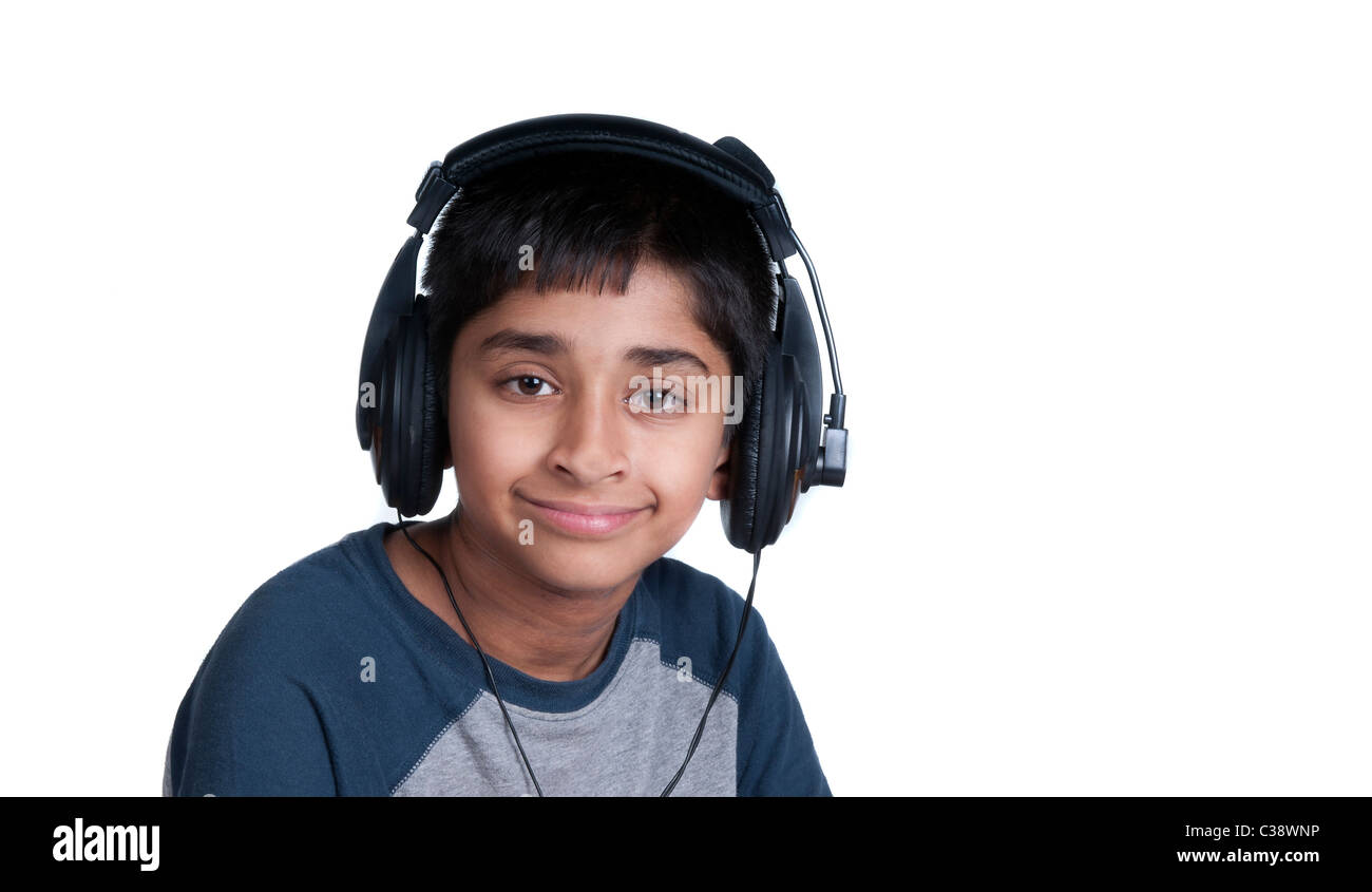 An handsome Indian kid enjoying music with lots of fun Stock Photo - Alamy