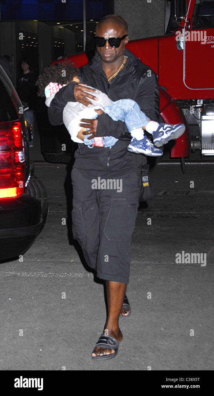 Seal, carrying his son Johan Samuel, arrives at Radio City Music Hall ...