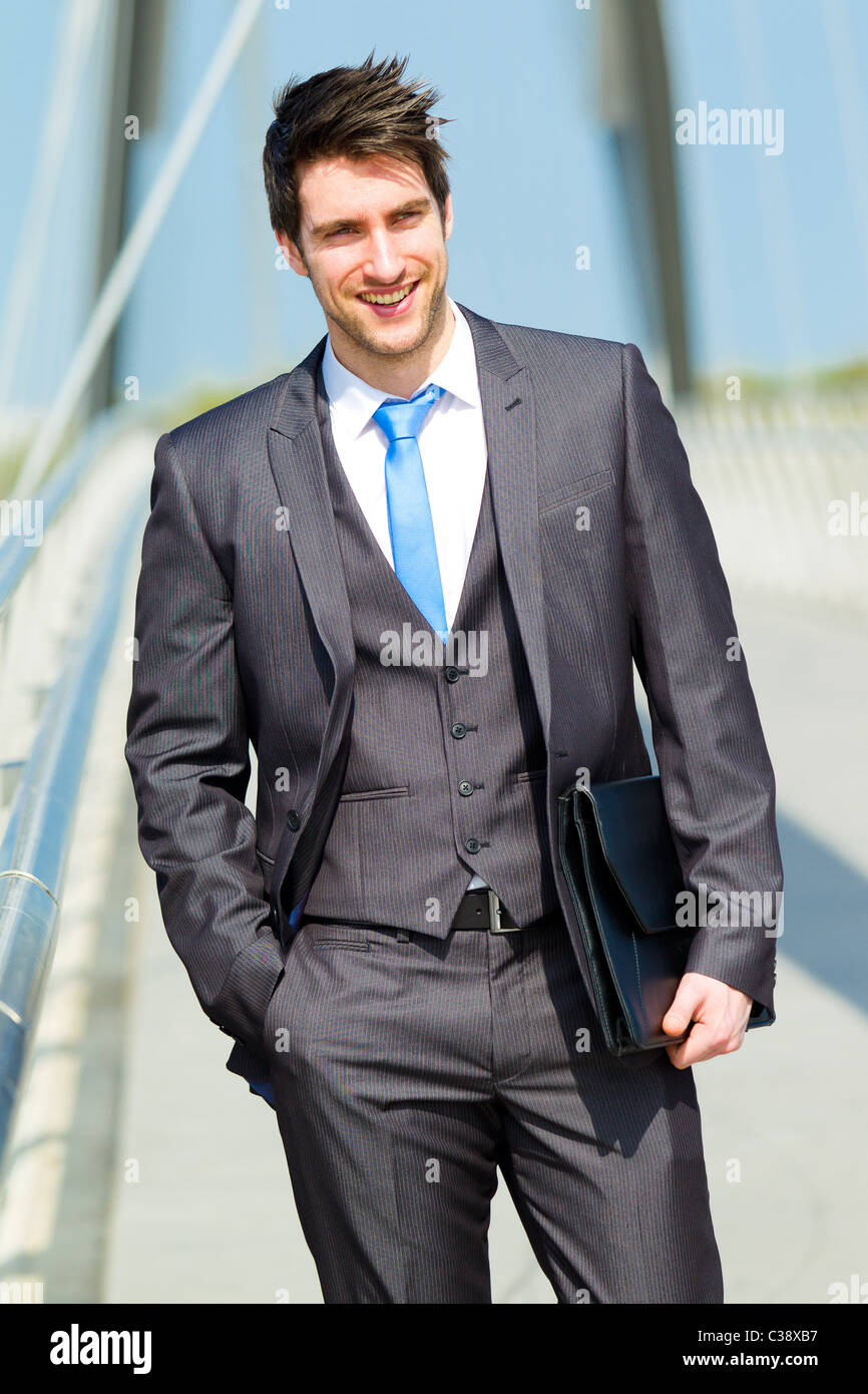Man walking to work Stock Photo - Alamy