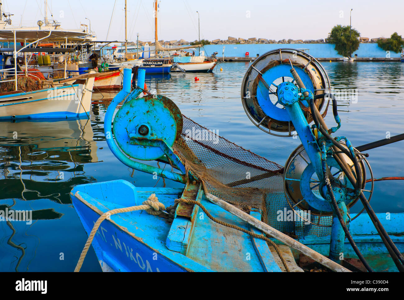 Greek traditional blue fishing boats in marina in Greece Stock Photo ...