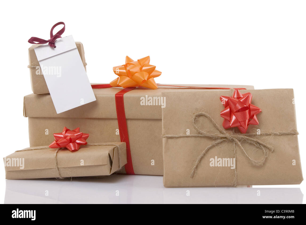 gift boxes with ribbon and blank label on white background Stock Photo ...