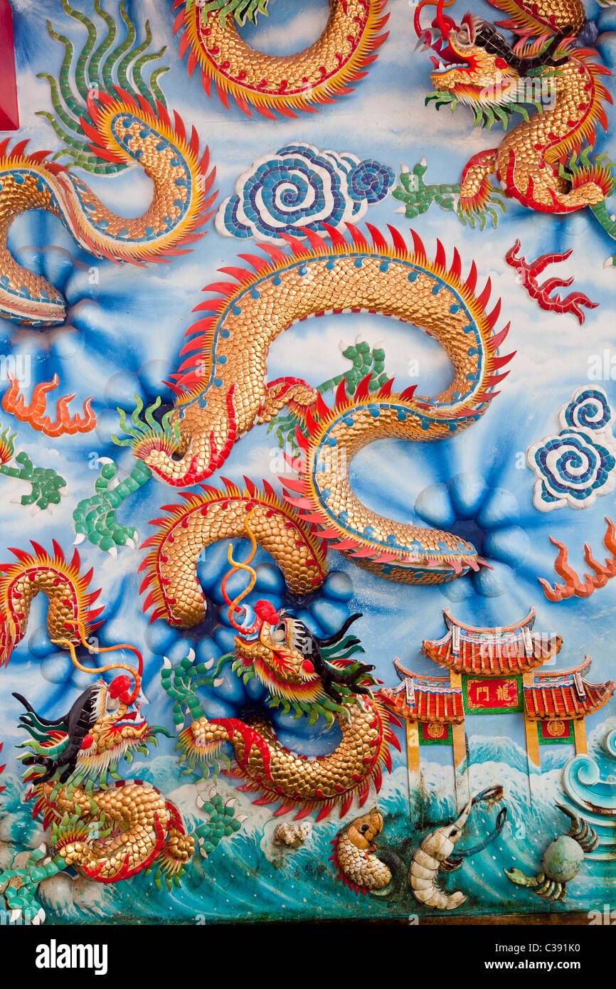 Wall display of sea creatures in Thailand; Chinese Shrine Temple near ...