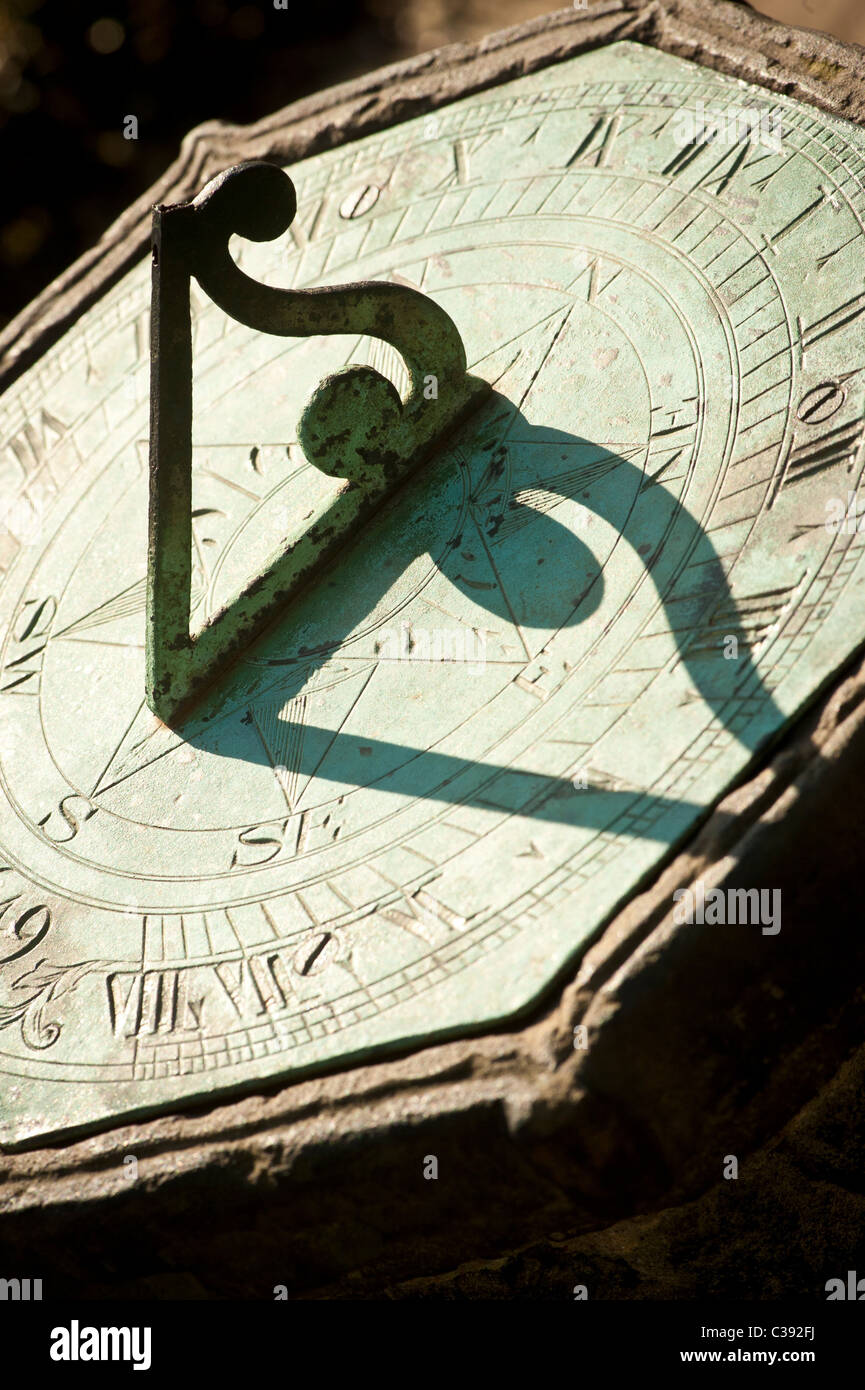 closeup of gnomon on a sundial in sunlight Stock Photo - Alamy