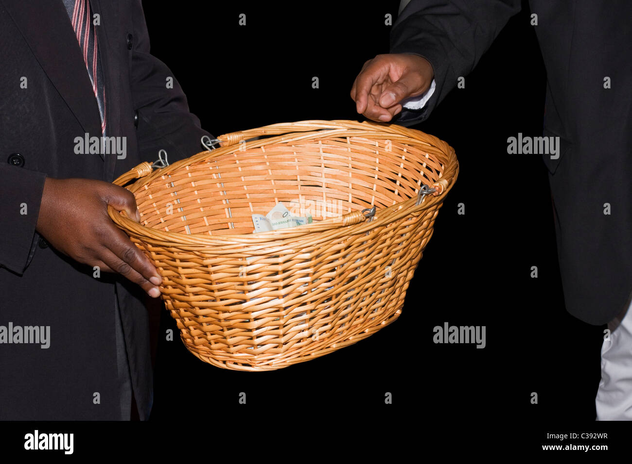 Church collection basket hi-res stock photography and images - Alamy
