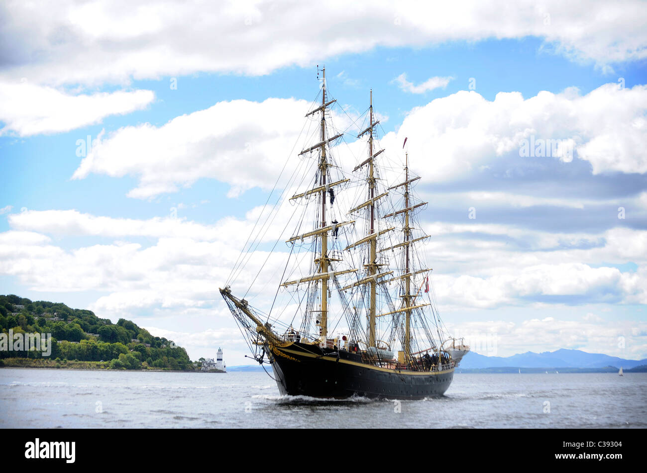 The Danish tall ship Georg Stage, built in 1882, sails up the River ...