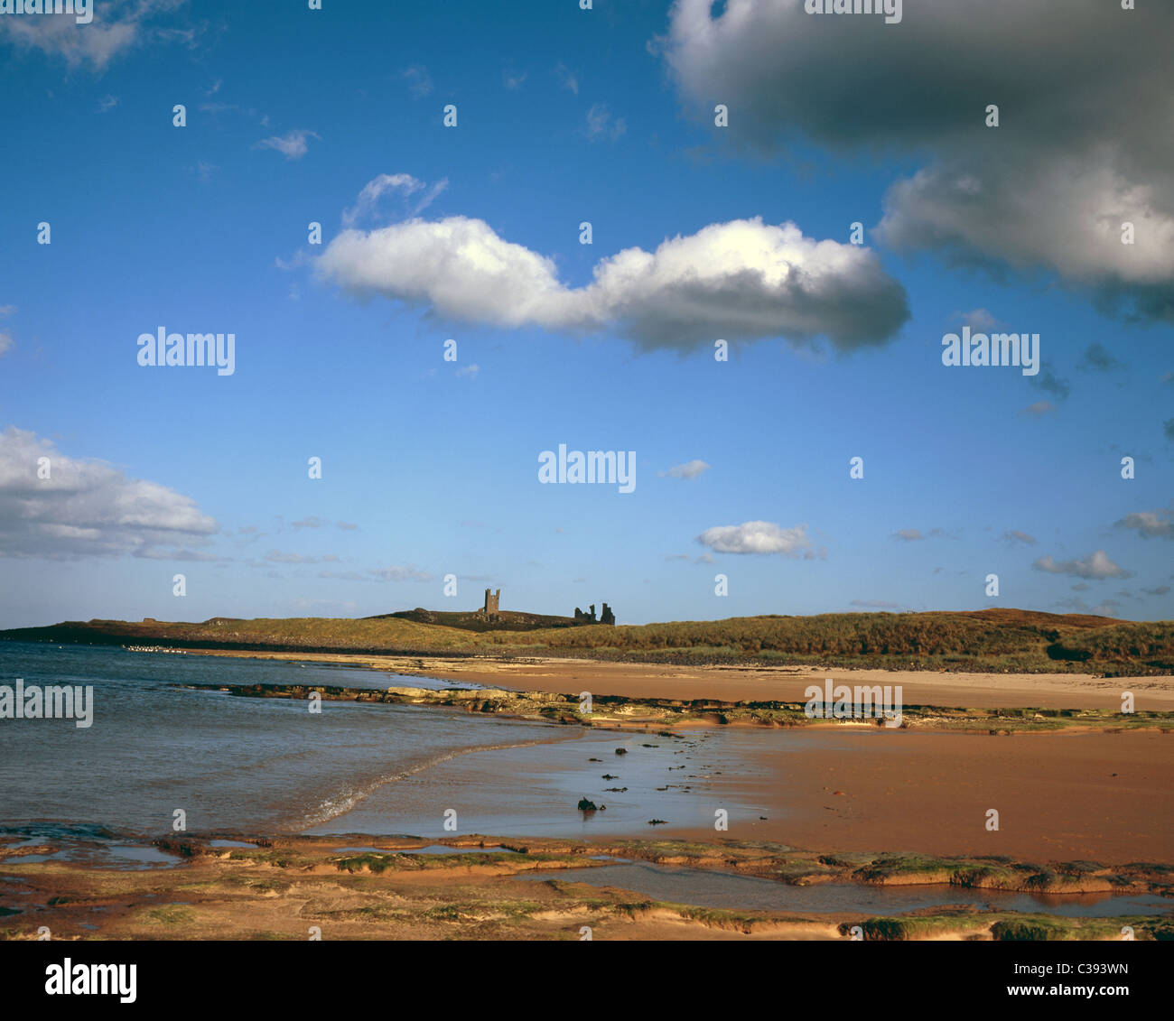 Dunstanburgh Castle from beach at Embleton Bay Embleton Northumberland ...