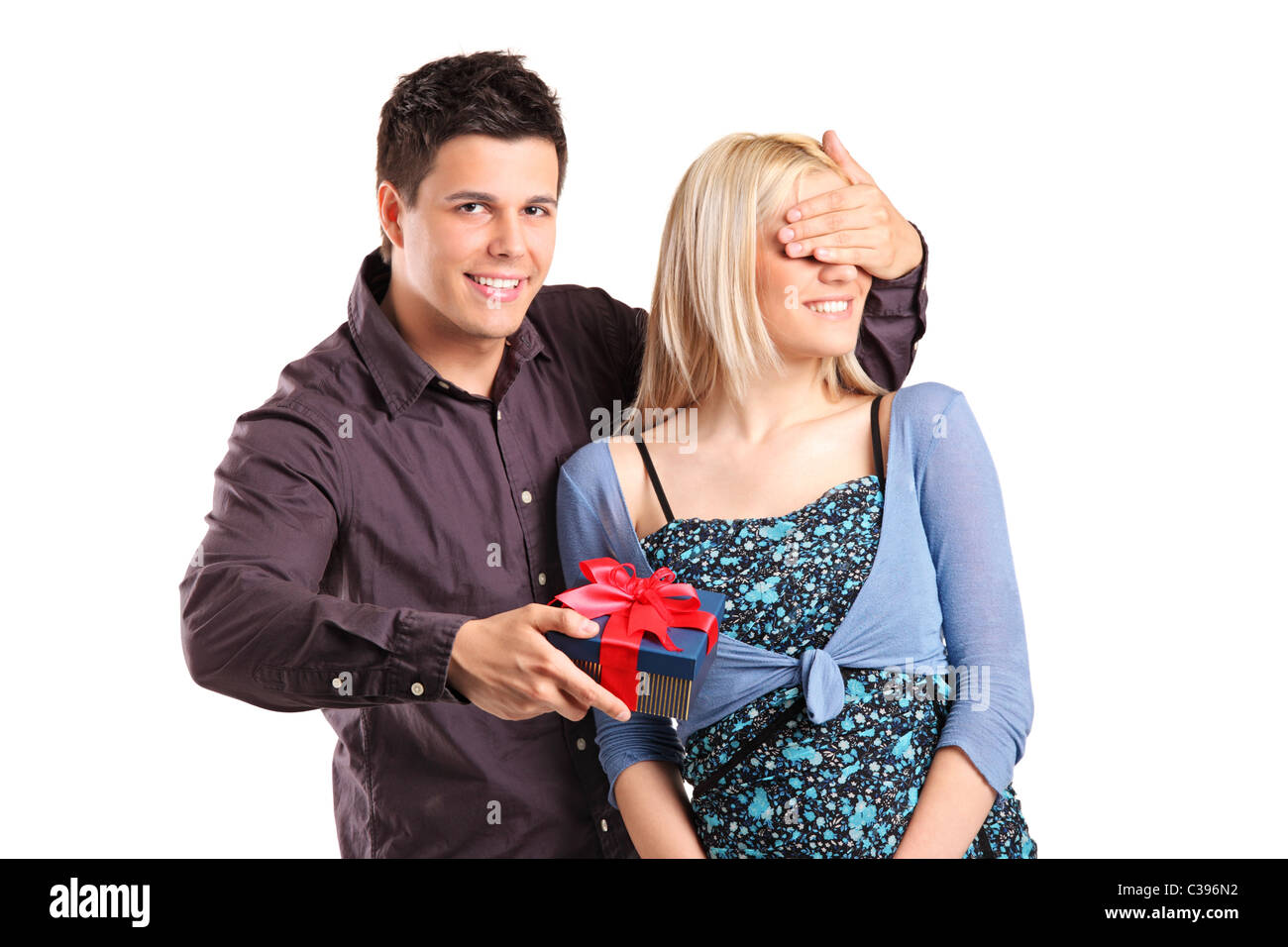 A Romantic Man Covering His Girlfriends Eyes To Surprise Her With A