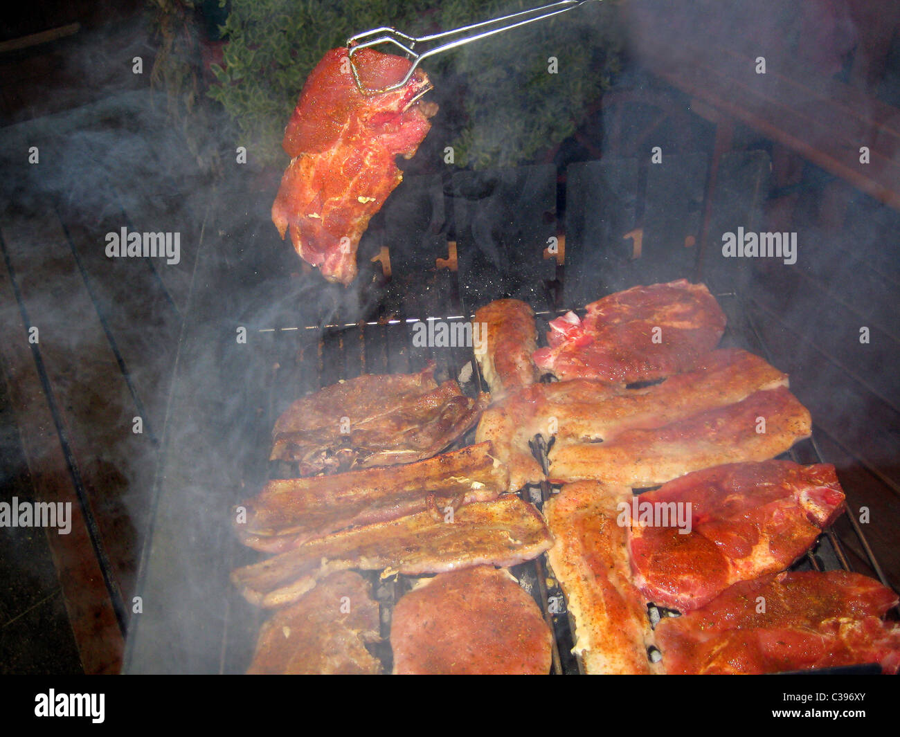 Turning meat hi-res stock photography and images - Alamy