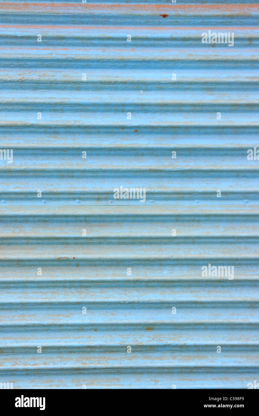 Old rusty blue corrugated iron plate texture detail Stock Photo - Alamy