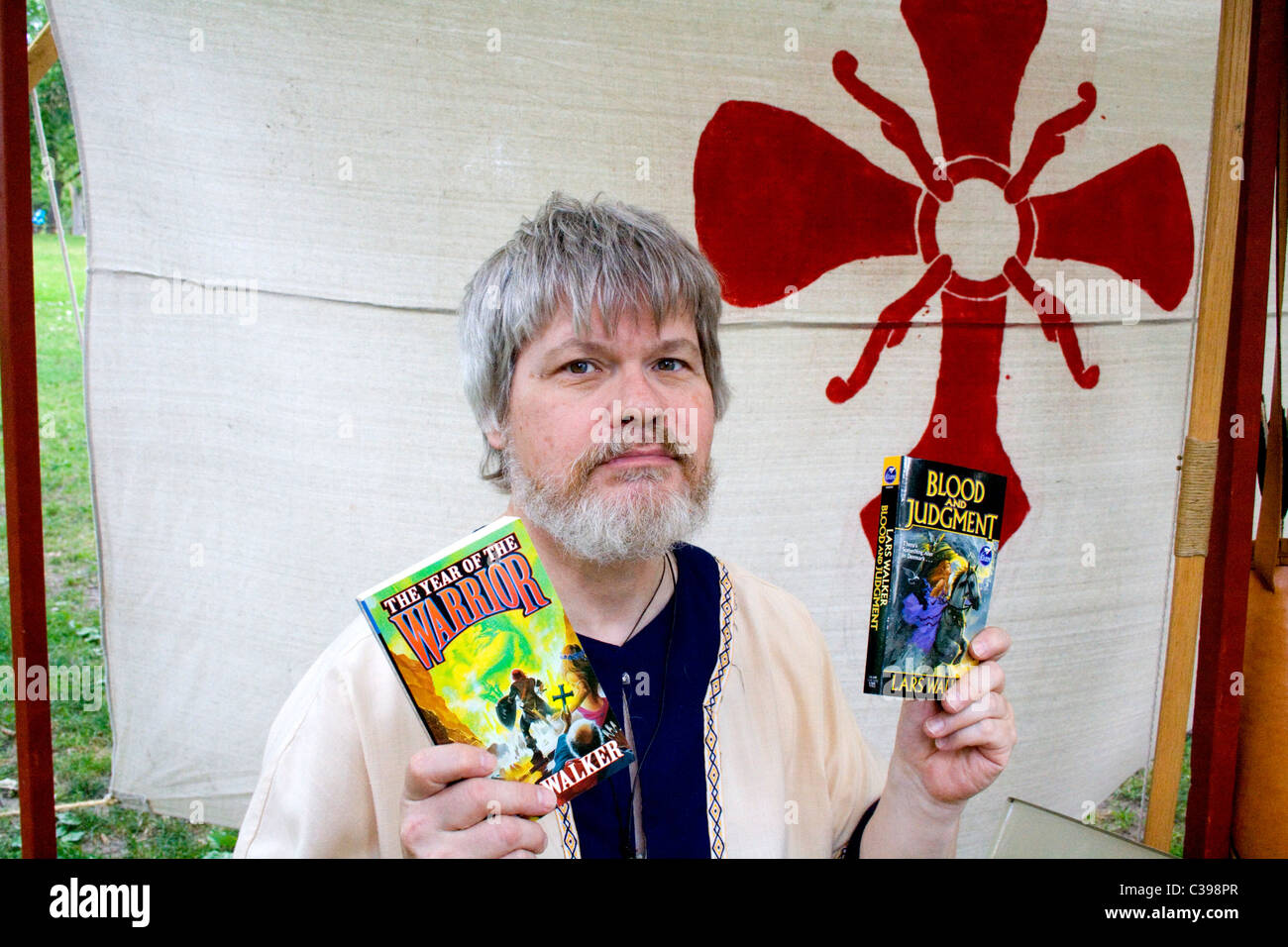 Author holding his books at Norway Day at Minnehaha Park. Minneapolis ...