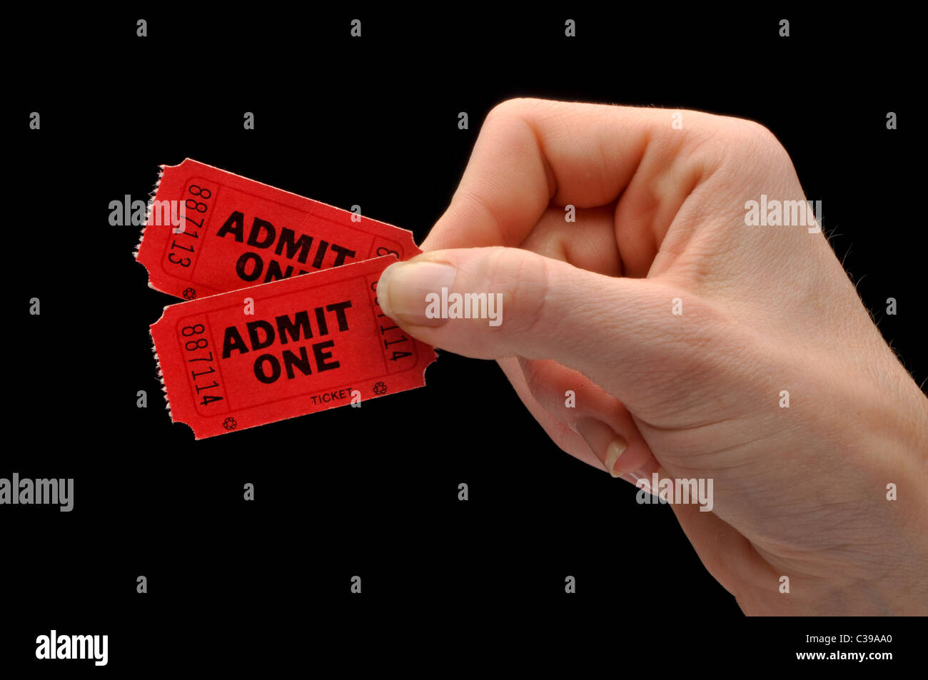 hand holding red movie theatre tickets Stock Photo - Alamy