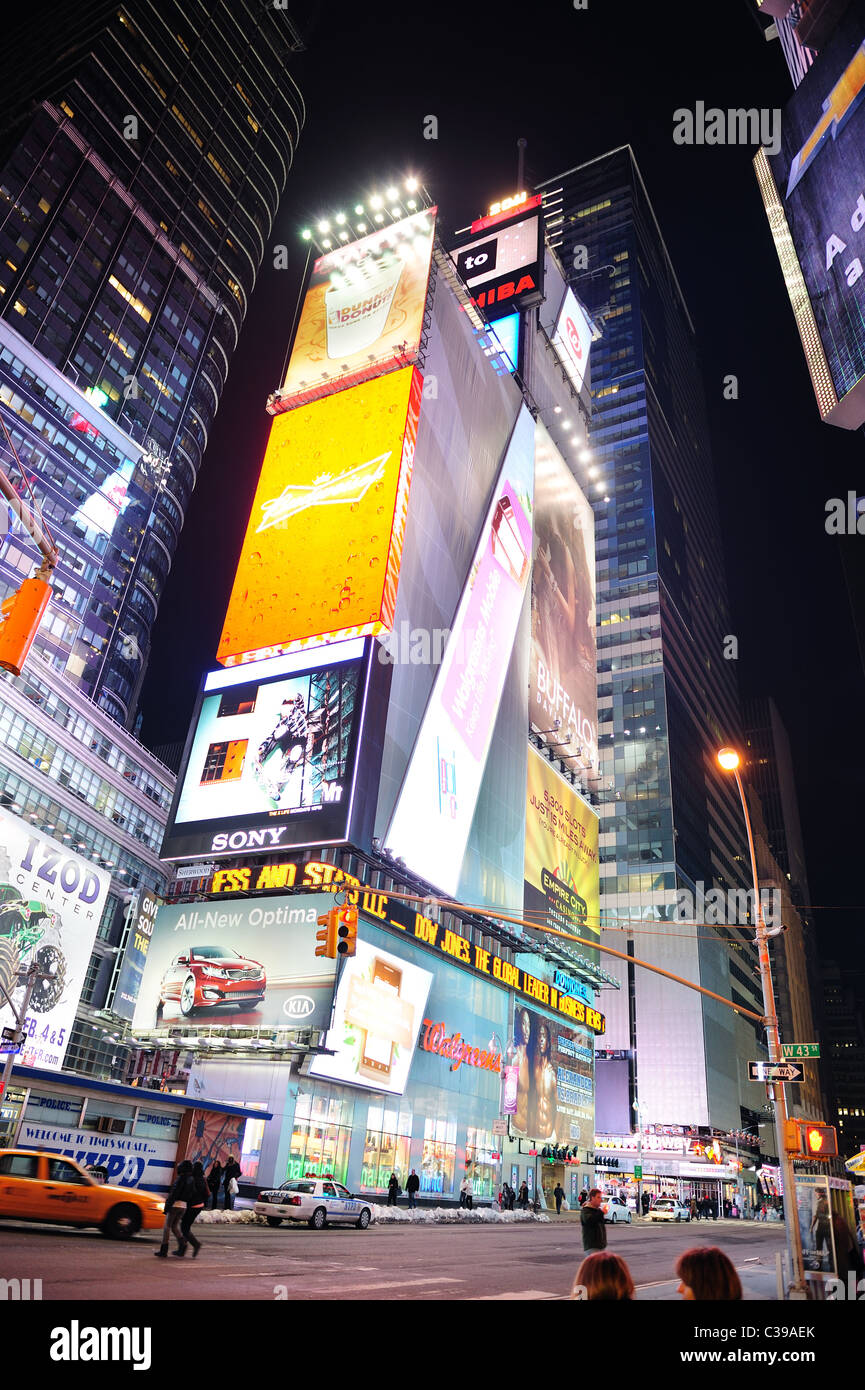 Times Square at night street view with busy traffic in Manhattan, New ...