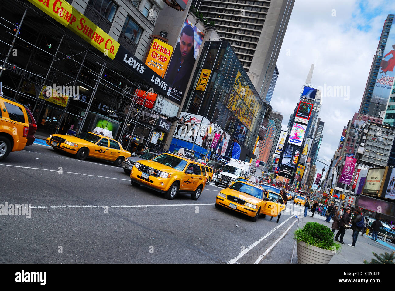 Times Square street view with busy traffic in Manhattan, New York City ...