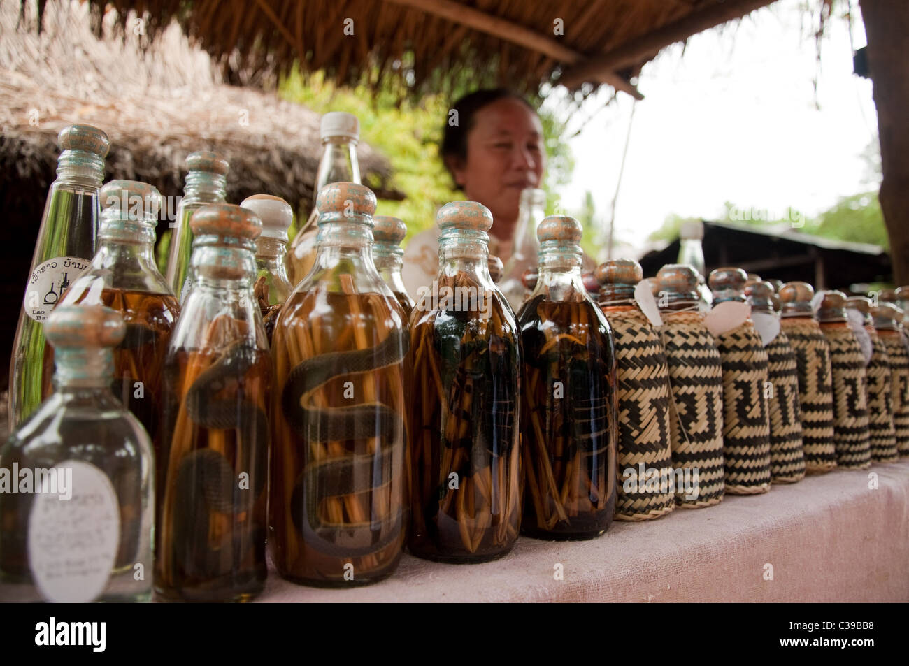 Snakes and scorpions preserved in Rice Whiskey in a Mekong River ...