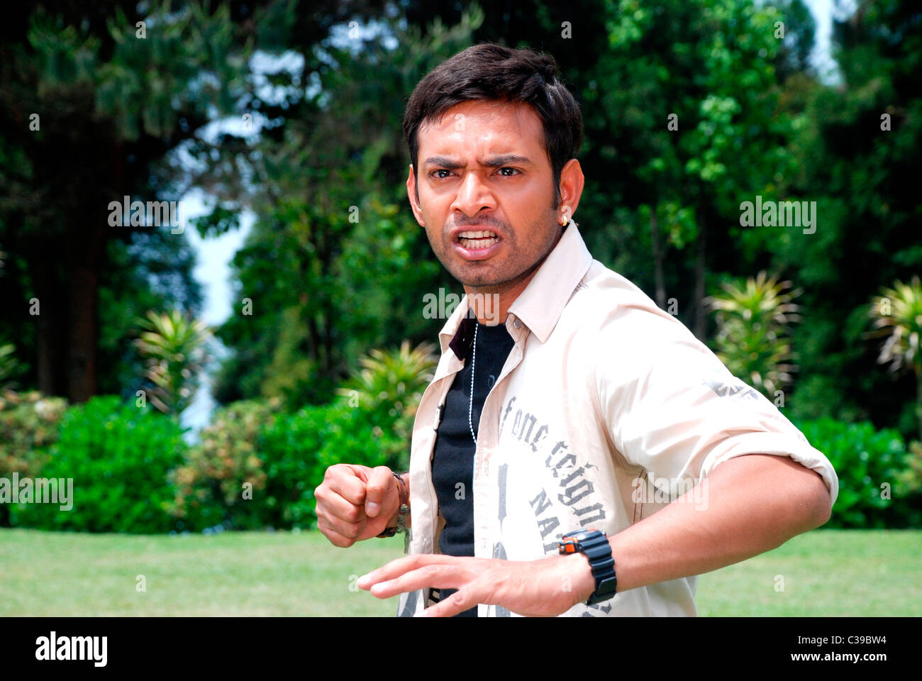 An Indian boy in aggressive mood Stock Photo - Alamy