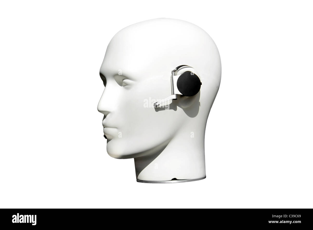 headphones on a human head model over white Stock Photo - Alamy