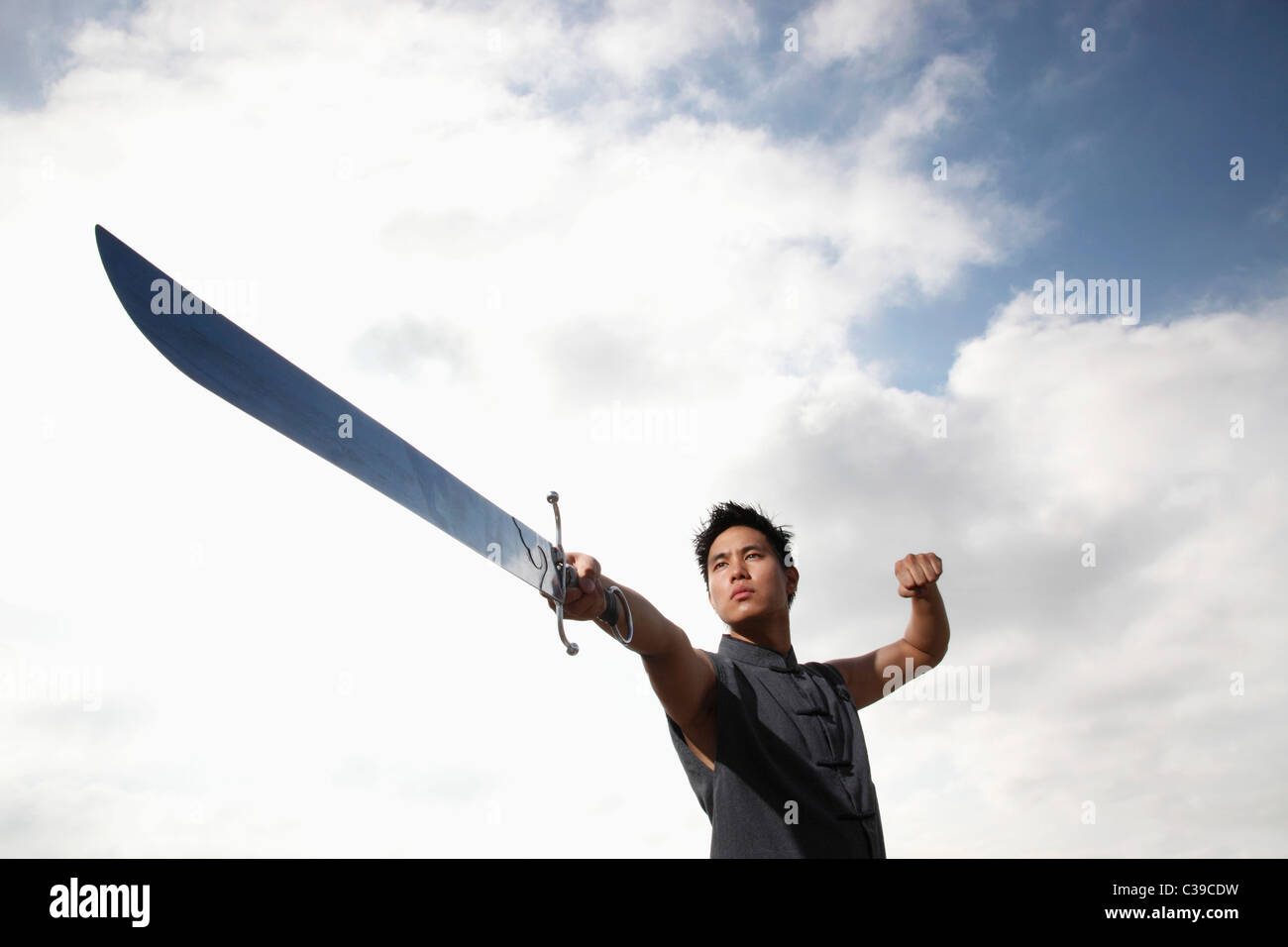 Chinese man pointing sword outside hi-res stock photography and images ...