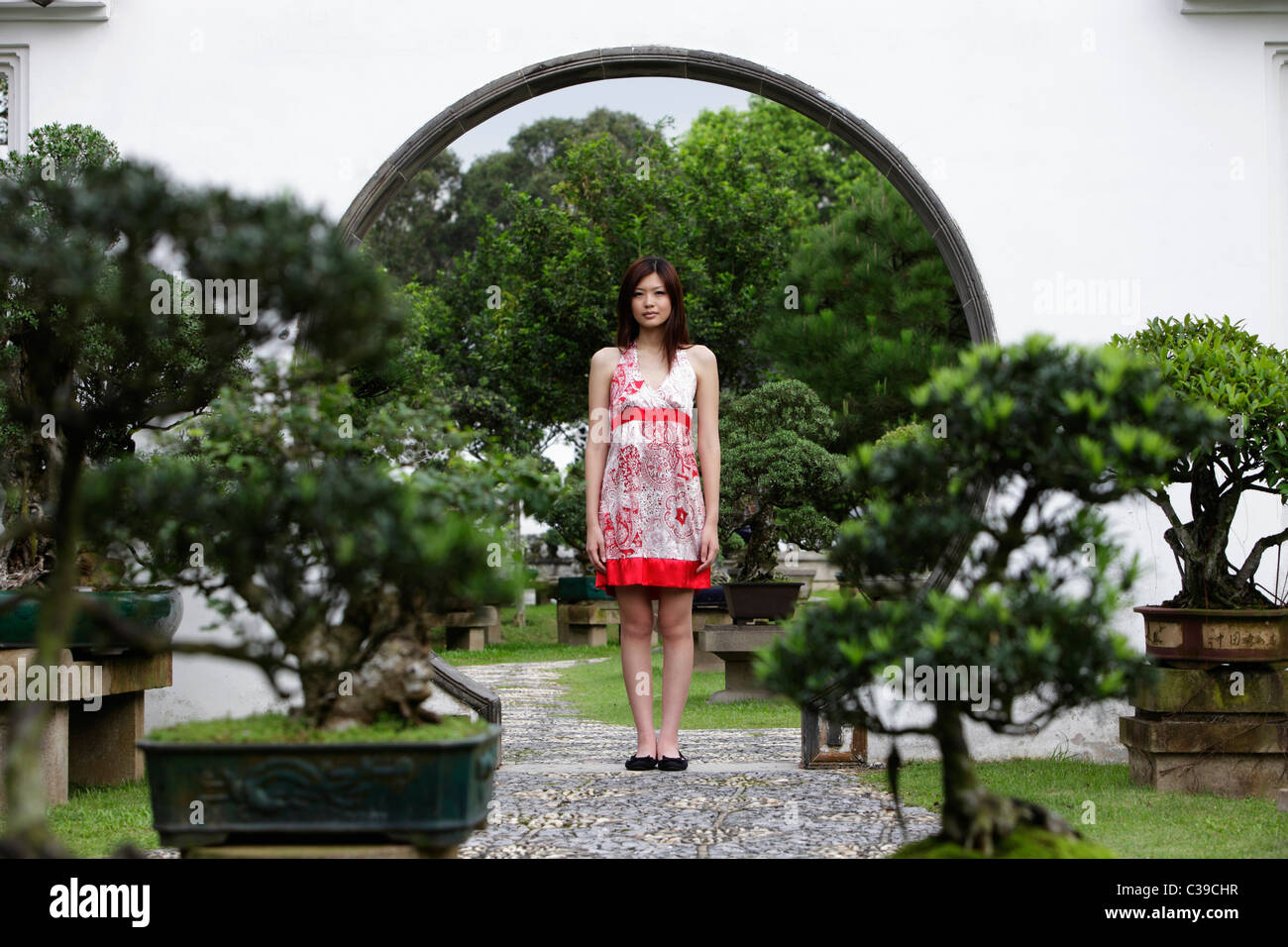 Full body woman standing straight hi-res stock photography and images ...