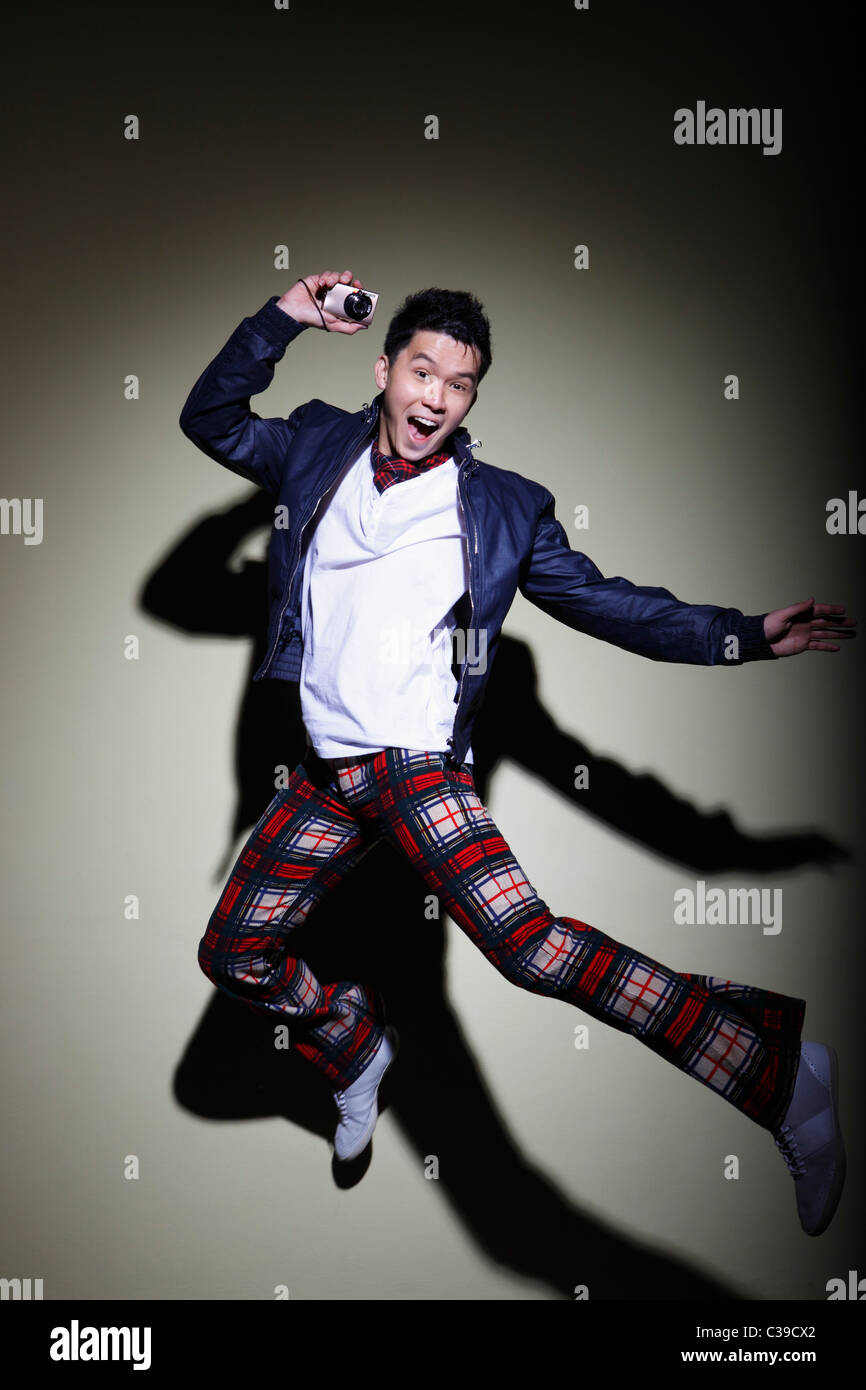 Chinese person jumping hi-res stock photography and images - Alamy