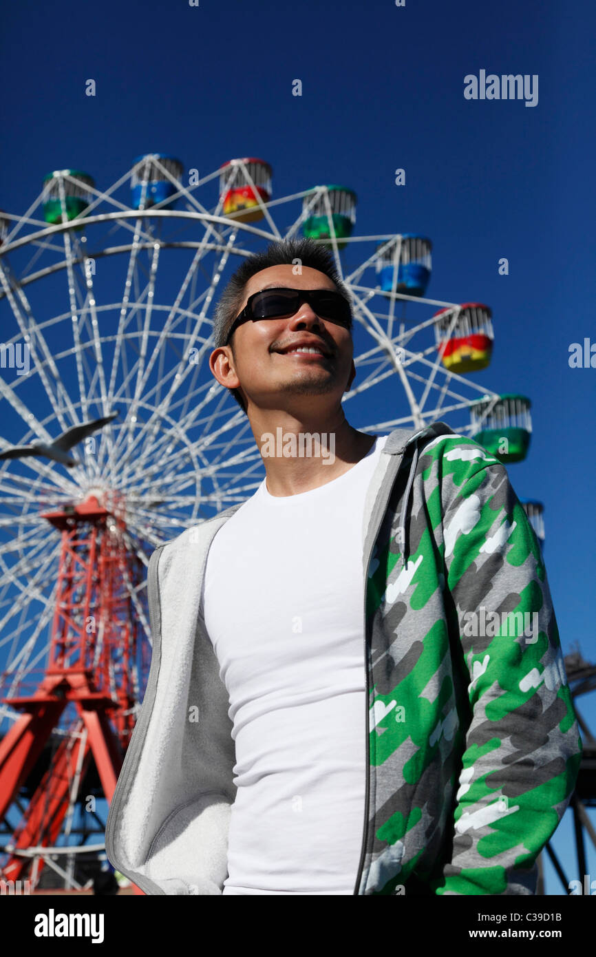 Man on a ferris wheel hi-res stock photography and images - Alamy