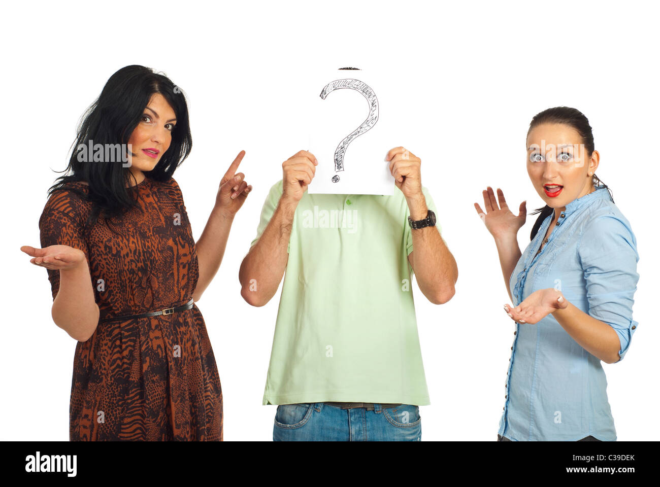 Surprised two women pointing to unknown guy who hold a question mark in ...
