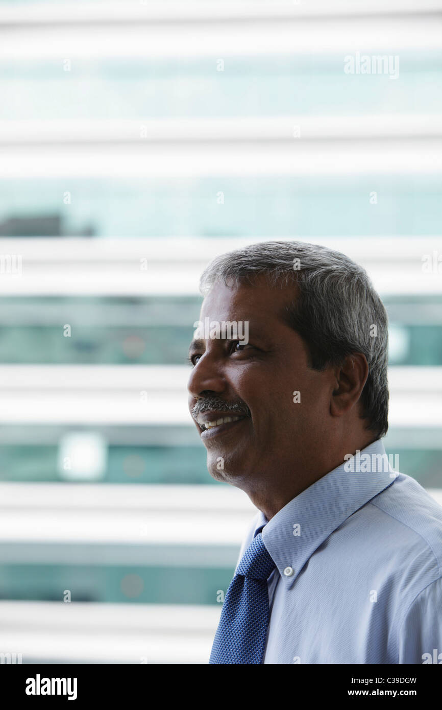 Profile of Indian man looking up Stock Photo - Alamy