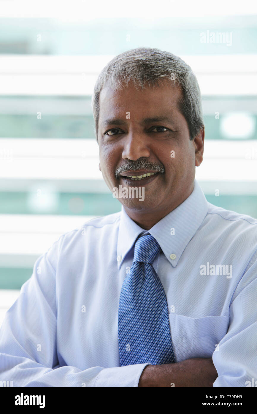 Head shot of Indian business man Stock Photo - Alamy