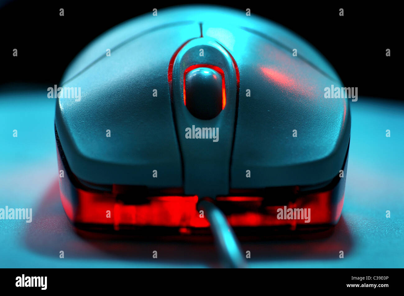 A man holding a computer mouse Stock Photo - Alamy