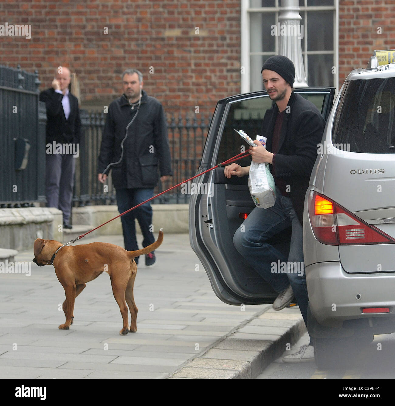 Watchmen' star Matthew Goode with his dog arriving at his hotel in a ...