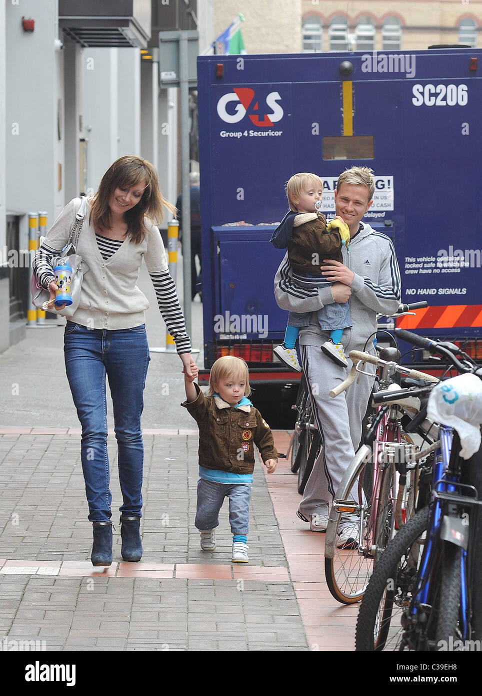 Nicky Byrne and wife Georgina Ahern walking with their twins, Jay and ...