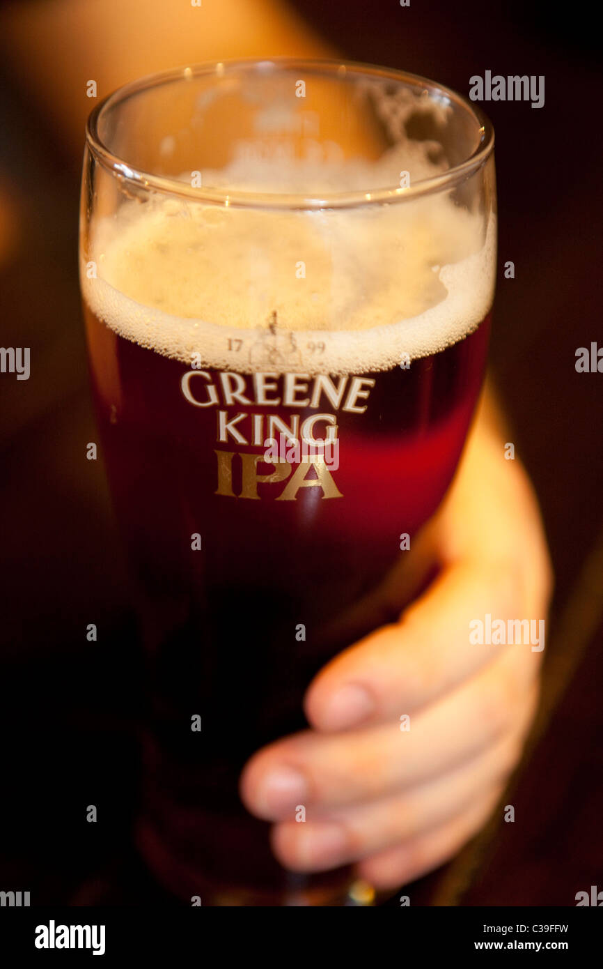 A pint of Greene King IPA in a branded glass Stock Photo - Alamy