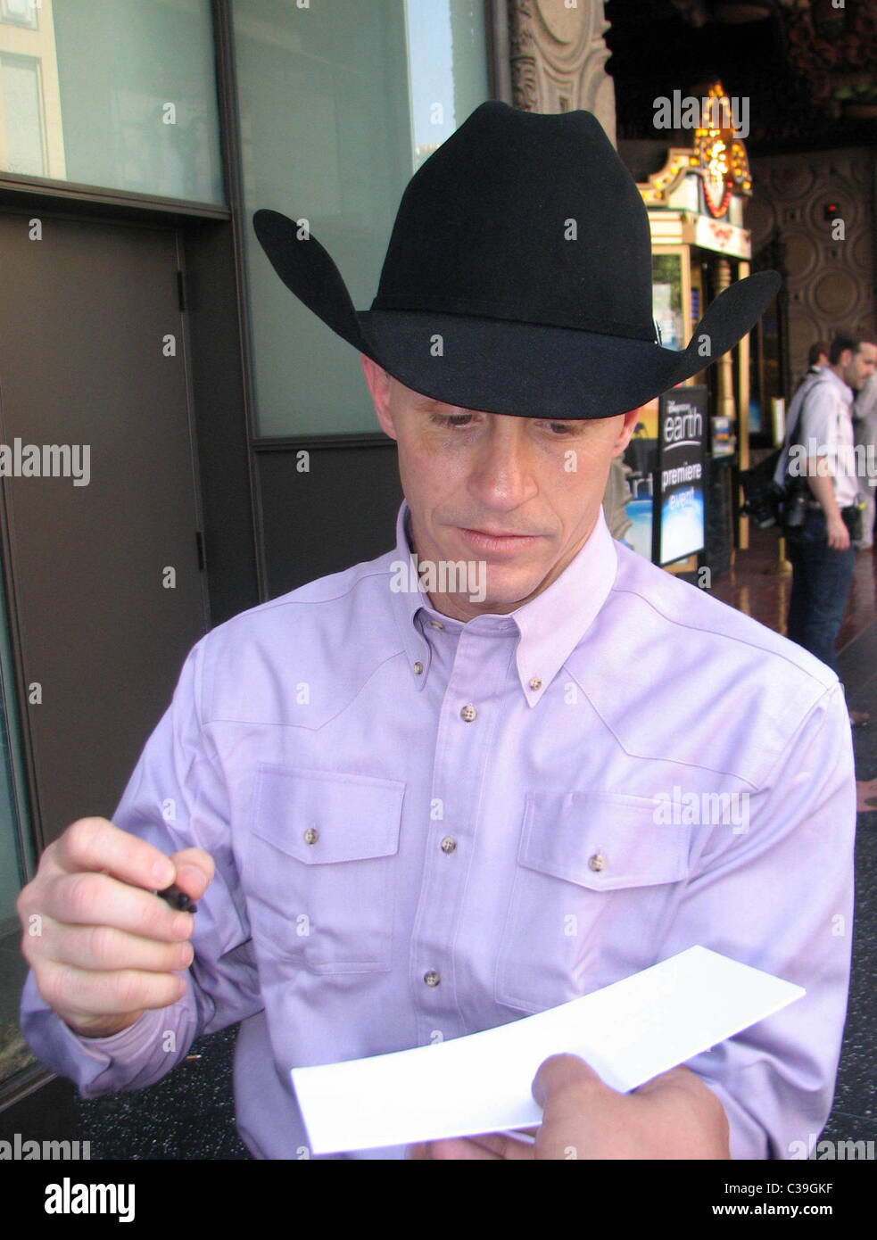 Ty Murray signs autographs for fans outside the El Capitan Theater ...