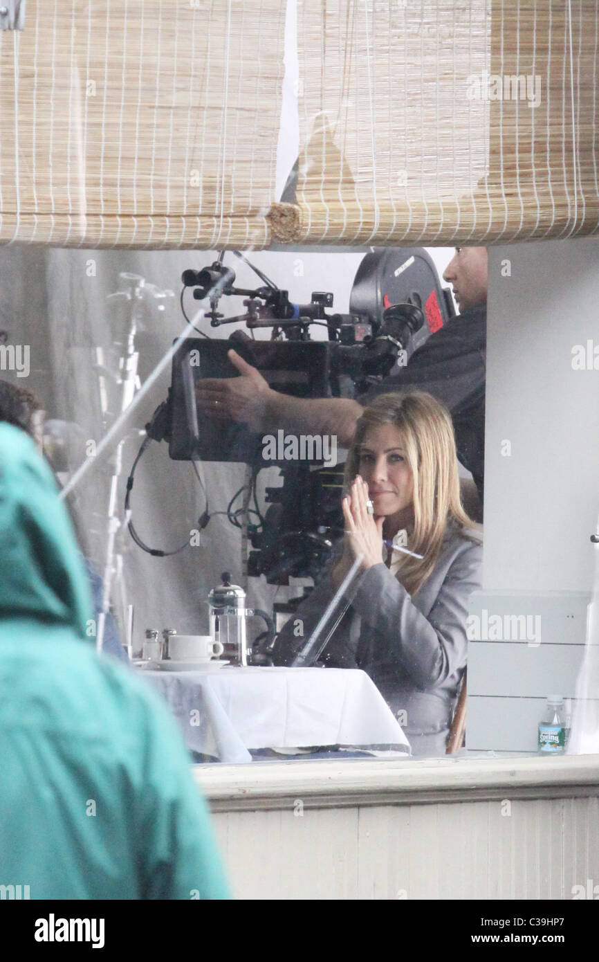 Jennifer Aniston films a scene for her new movie 'The Baster' at a cafe ...
