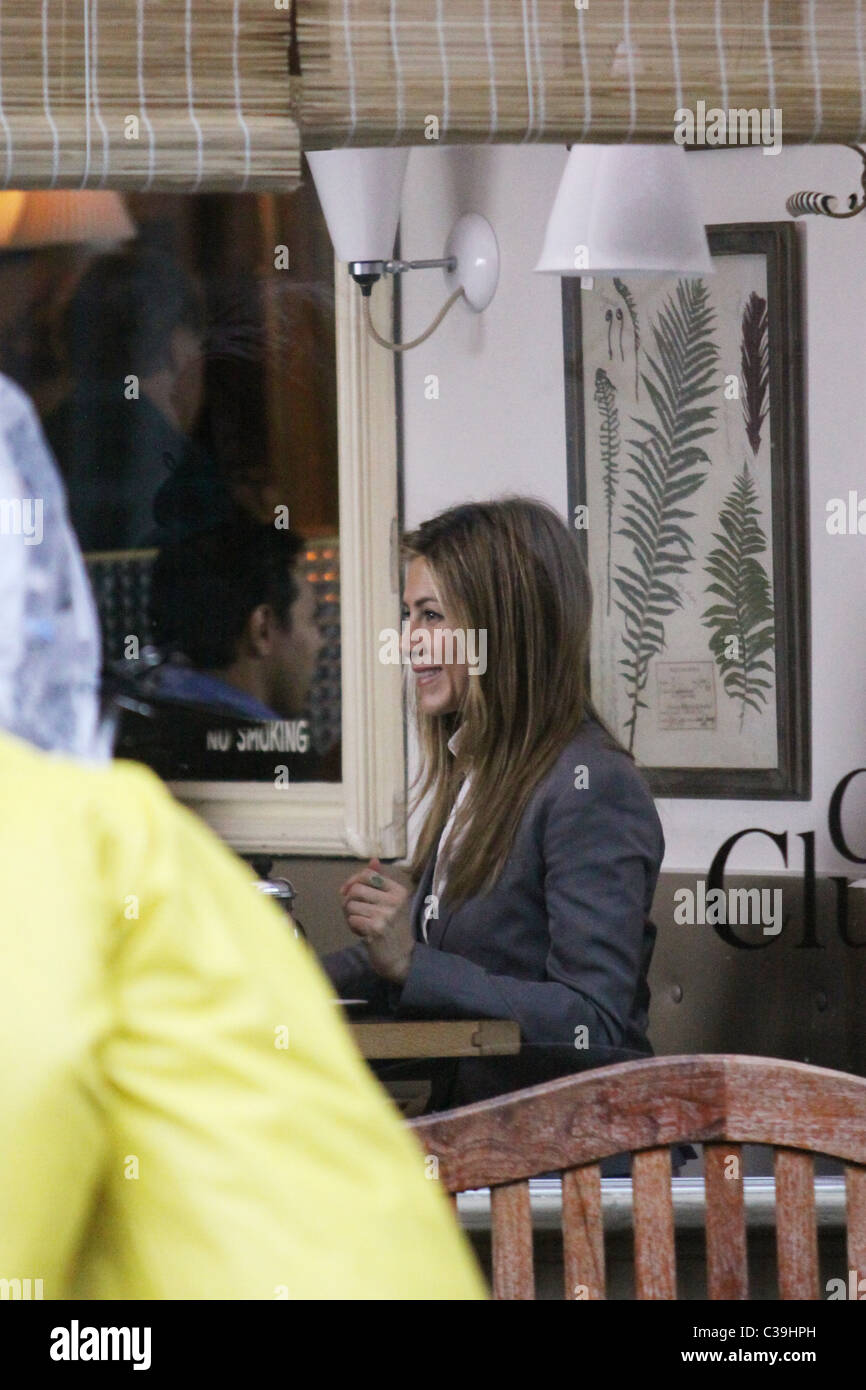 Jennifer Aniston films a scene for her new movie 'The Baster' at a cafe ...