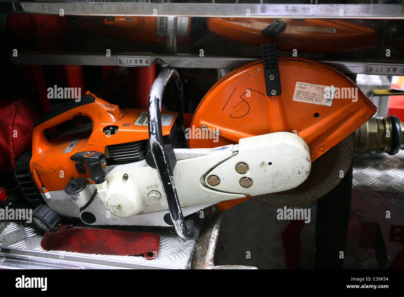 Fire electric saw Stock Photo - Alamy