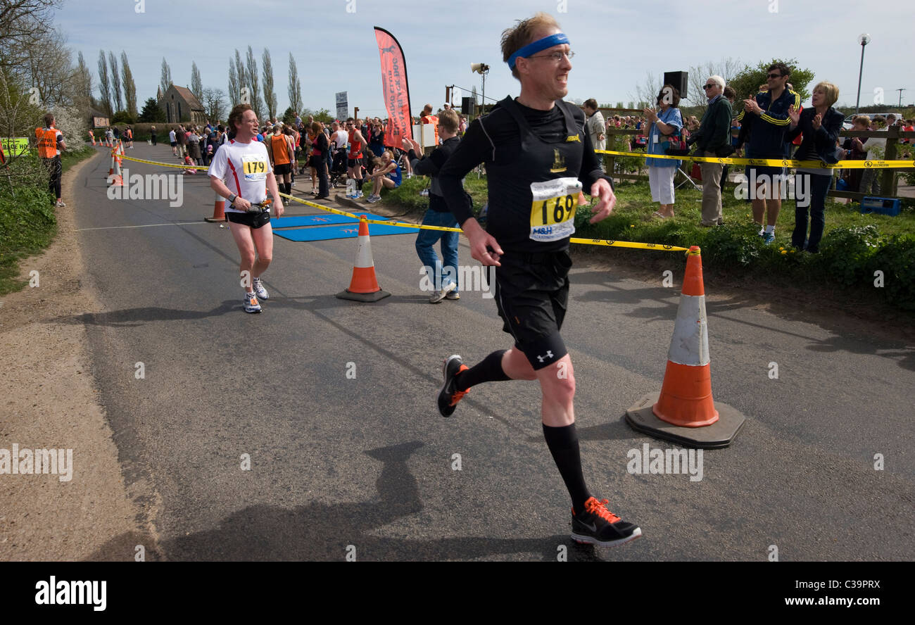 man running local club marathon Stock Photo - Alamy