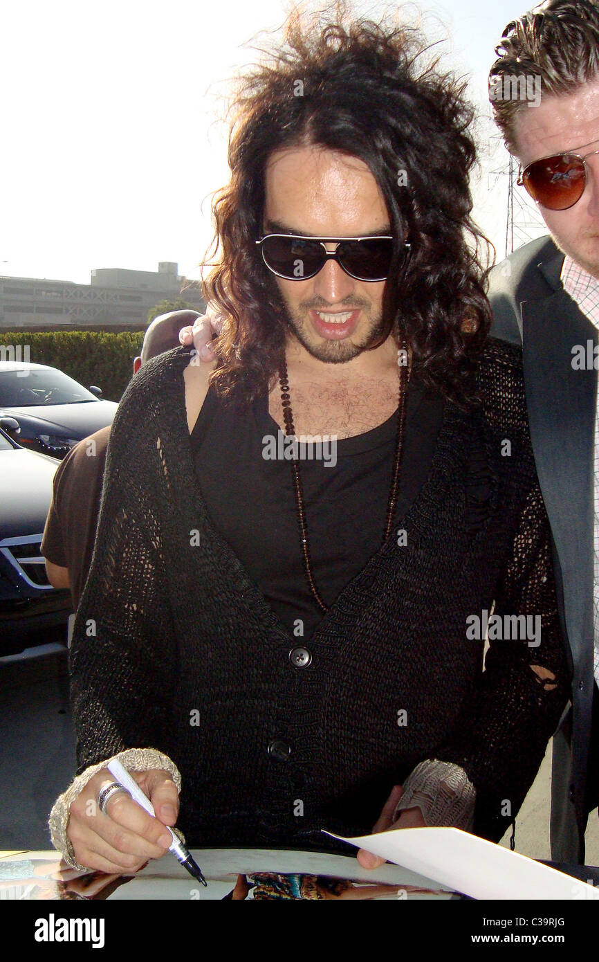 Russell Brand signing autographs for fans outside 'The Tonight Show ...