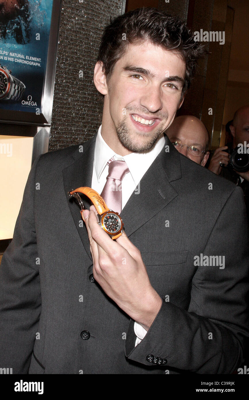 Michael Phelps Olympic swimmer Michael Phelps opens the new OMEGA ...