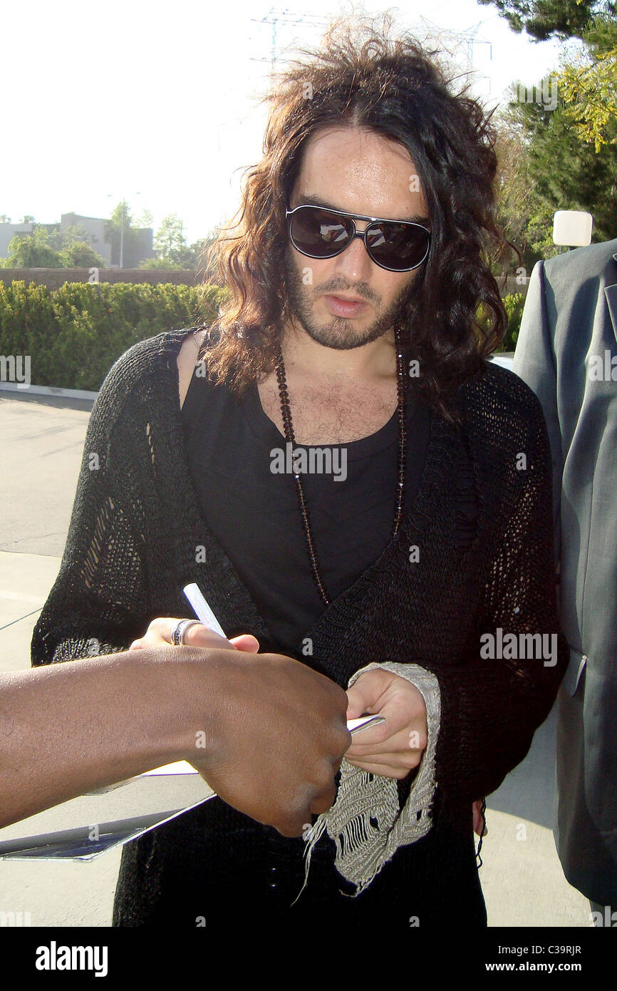 Russell Brand signing autographs for fans outside 'The Tonight Show ...