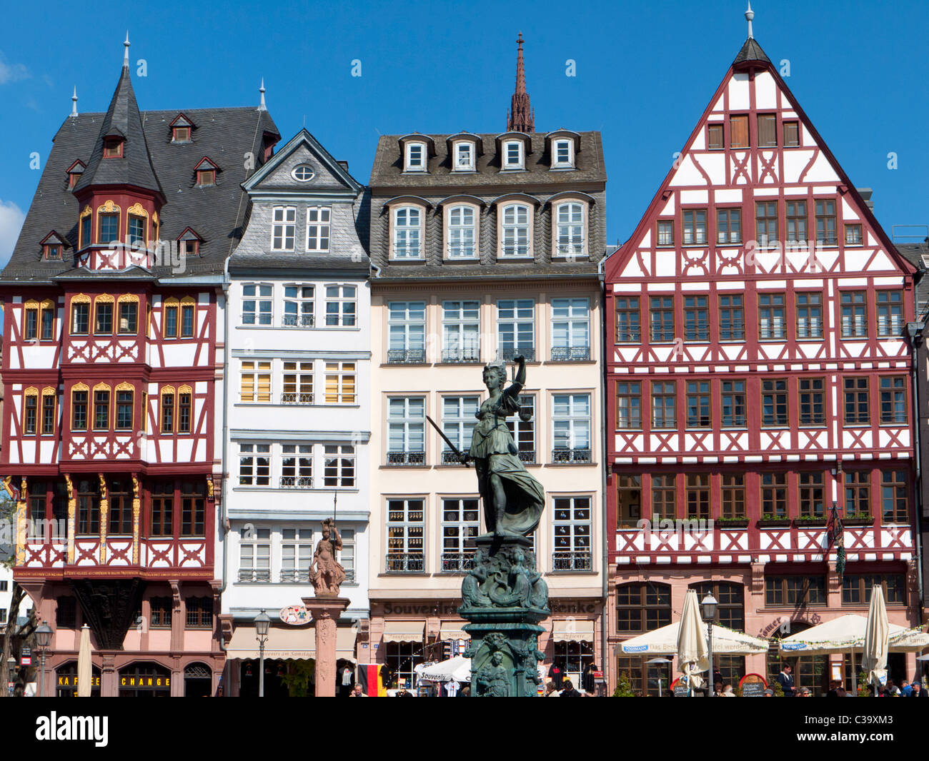 Romer Square with historic timbered houses and Justitia fountain statue ...