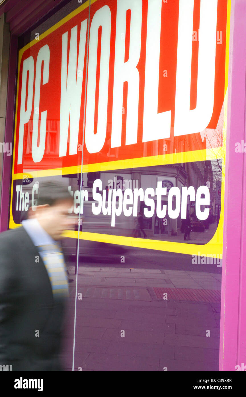 A man walks past a PC World computer store Stock Photo - Alamy