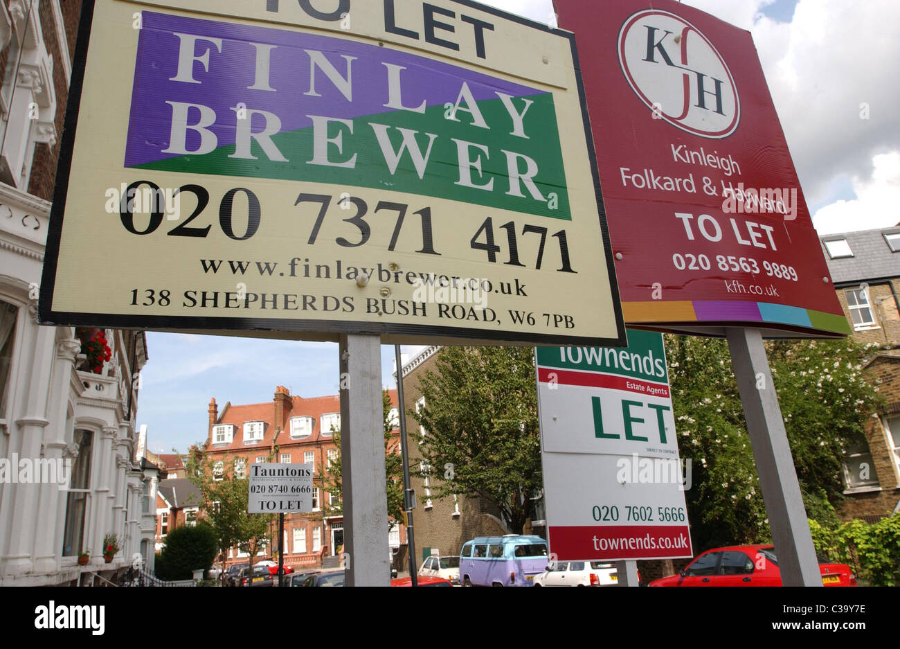various For Sale and To Let signs outside houses Stock Photo - Alamy