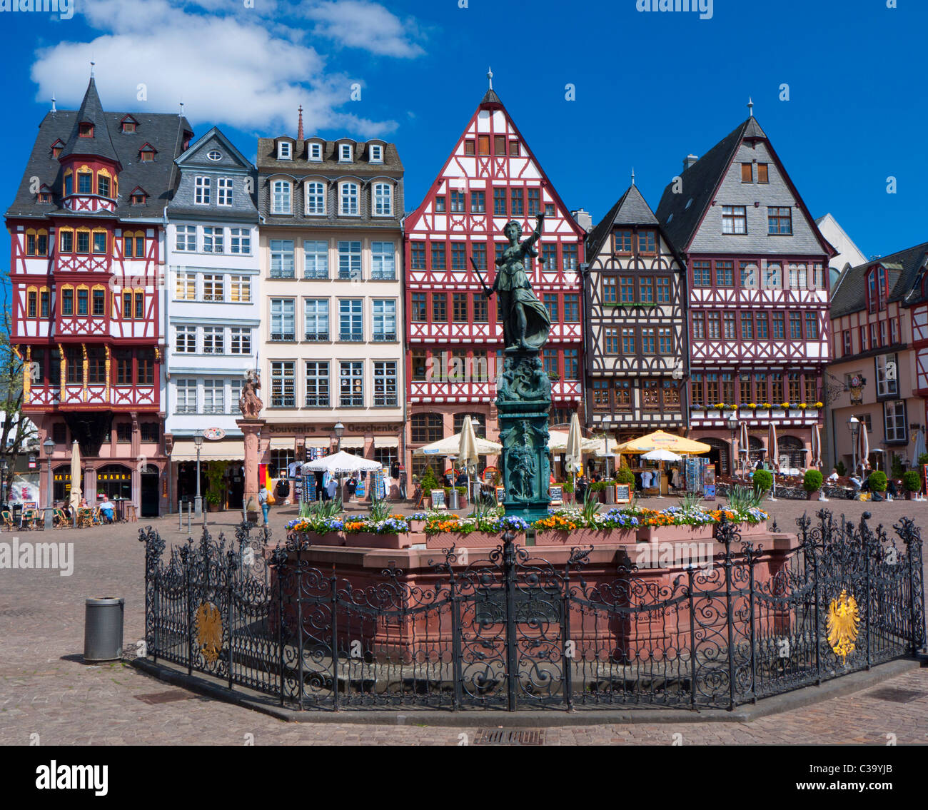 Romer Square with historic timbered houses and Justitia fountain at ...