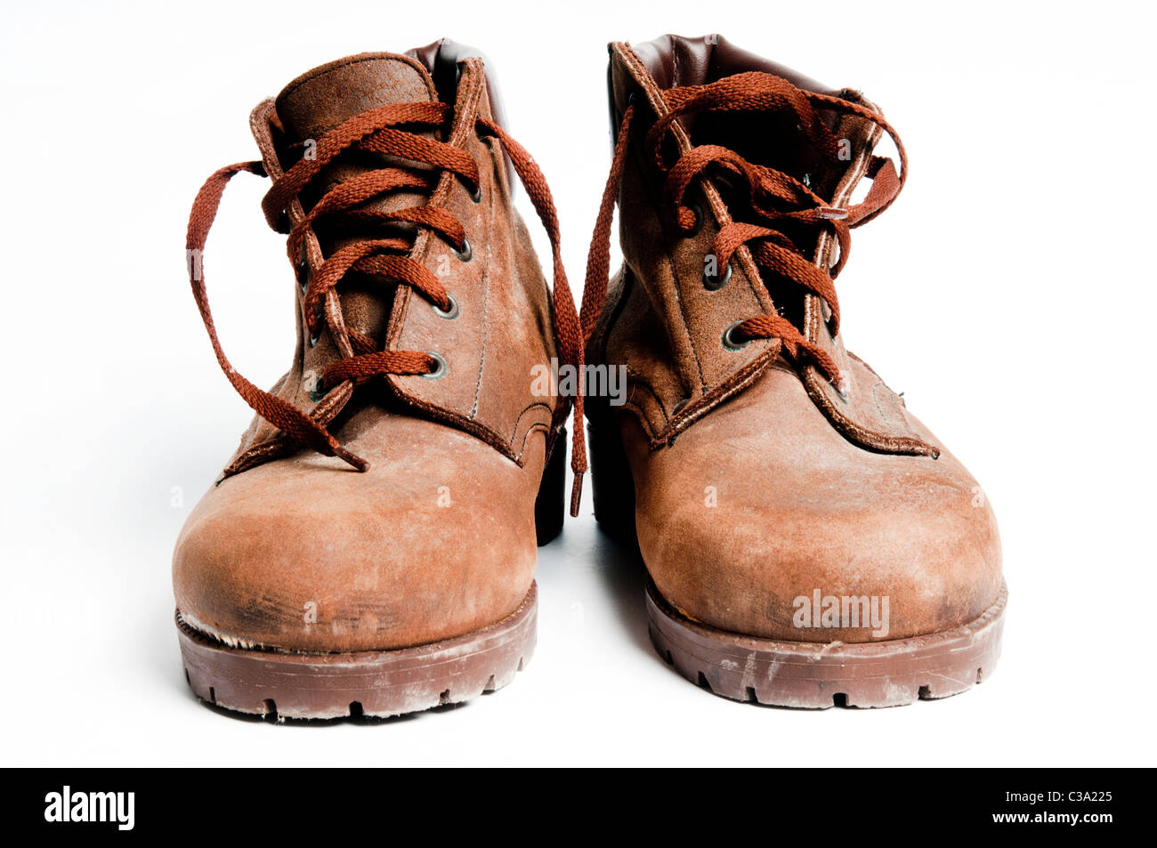 pair of old worn out boots, isolated Stock Photo - Alamy